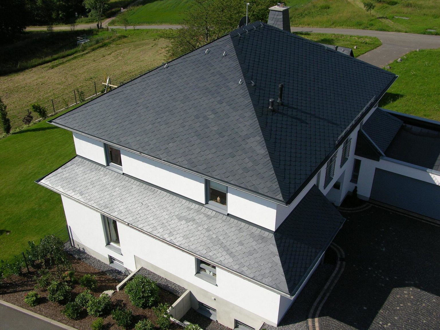 Schieferplatten an der Fassade: Deckungsarten - Rathscheck Schiefer